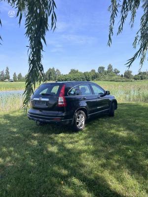 Brūns Honda CR-V 2010 Ukmergė, ar dzinēja tilpumu 2.20 L un nobraukumu 261 tūkst. km par 5600 €, foto 6 vietnē AUTOMOTO.COM.LV