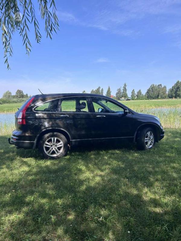 Brown Honda CR-V 2010 in Ukmerge, with an engine capacity of 2.20 L and mileage of 261 thousand km for 5600 €, photo 10 on AUTOMOTO.COM.LV