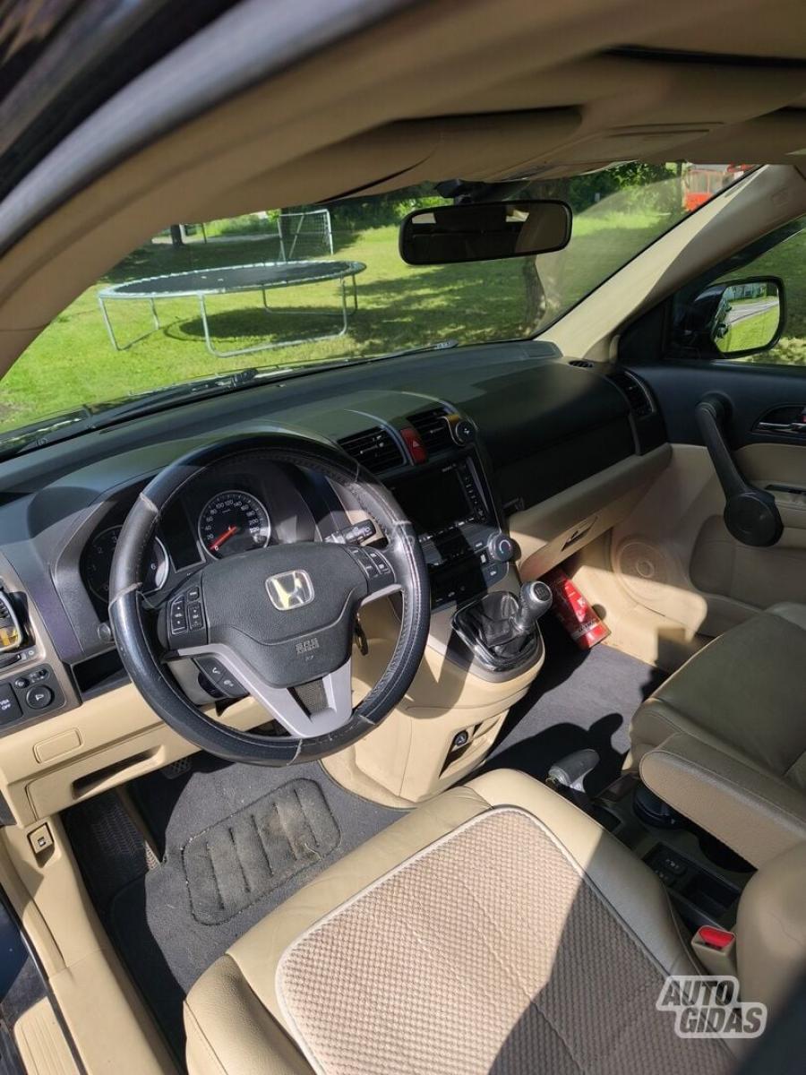Brown Honda CR-V 2010 in Utena, with an engine capacity of 2.20 L and mileage of 341 thousand km for 5800 €, photo 5 on AUTOMOTO.COM.LV