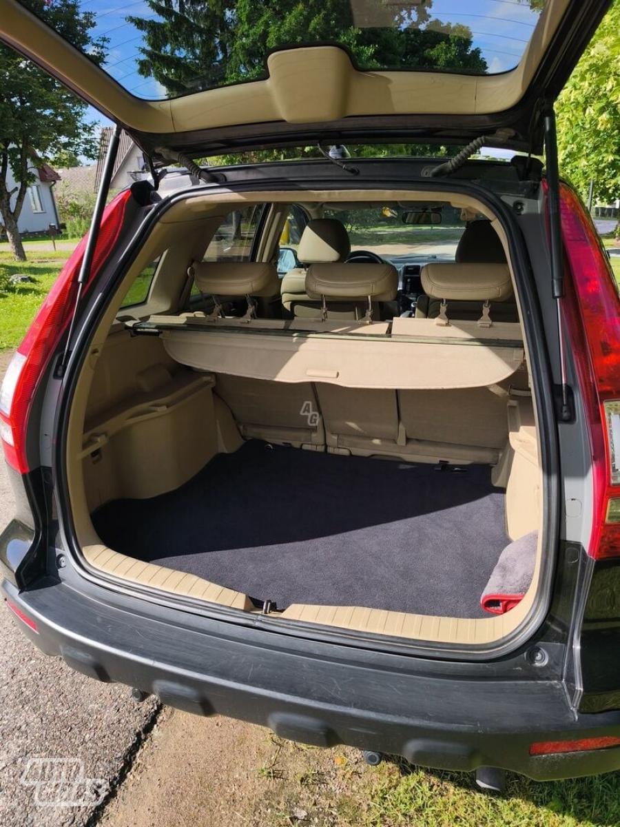 Brown Honda CR-V 2010 in Utena, with an engine capacity of 2.20 L and mileage of 341 thousand km for 5800 €, photo 6 on AUTOMOTO.COM.LV
