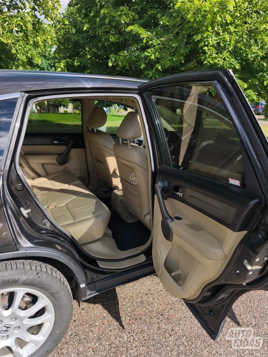 Brown Honda CR-V 2010 in Utena, with an engine capacity of 2.20 L and mileage of 341 thousand km for 5800 €, photo 10 on AUTOMOTO.COM.LV