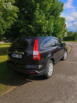 Brown Honda CR-V 2010 in Utena, with an engine capacity of 2.20 L and mileage of 341 thousand km for 5800 €, photo 12 on AUTOMOTO.COM.LV