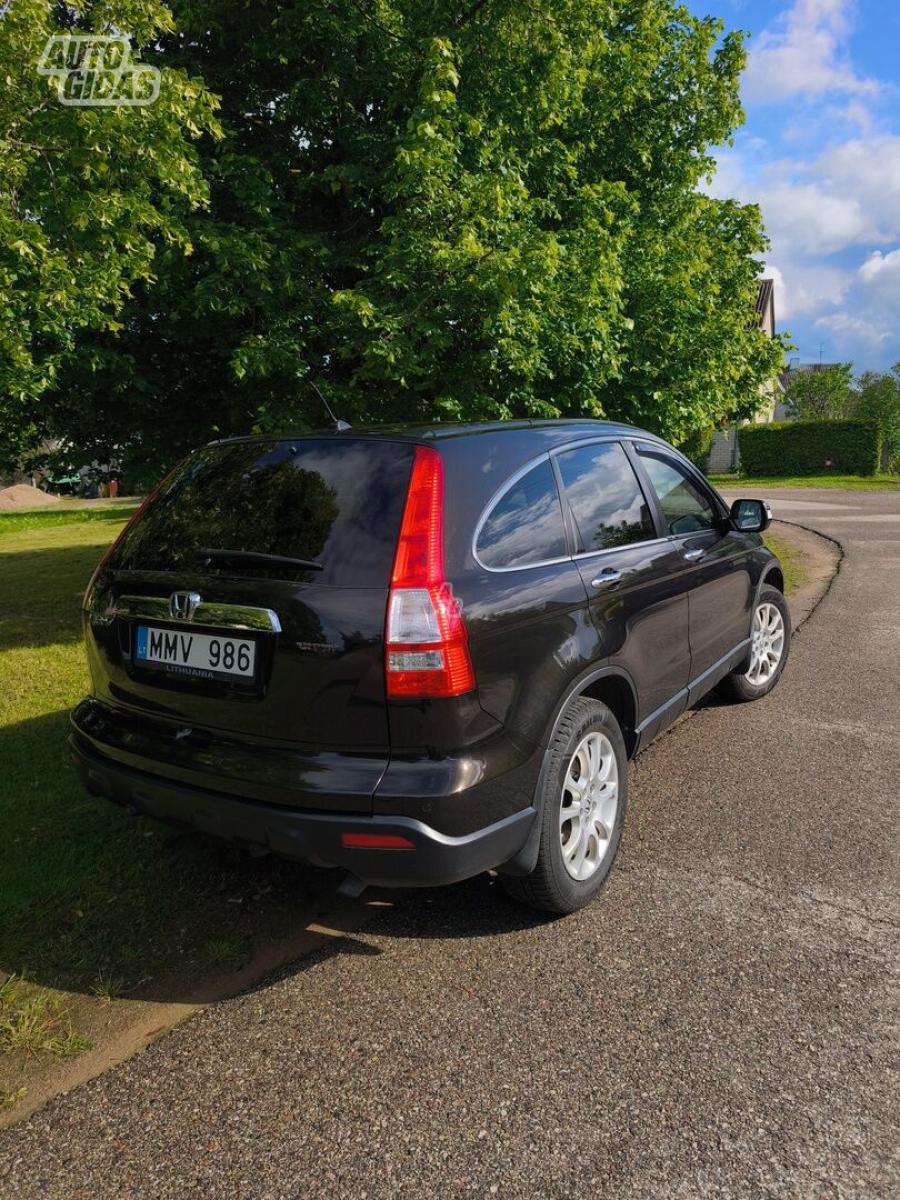 Brown Honda CR-V 2010 in Utena, with an engine capacity of 2.20 L and mileage of 341 thousand km for 5800 €, photo 12 on AUTOMOTO.COM.LV
