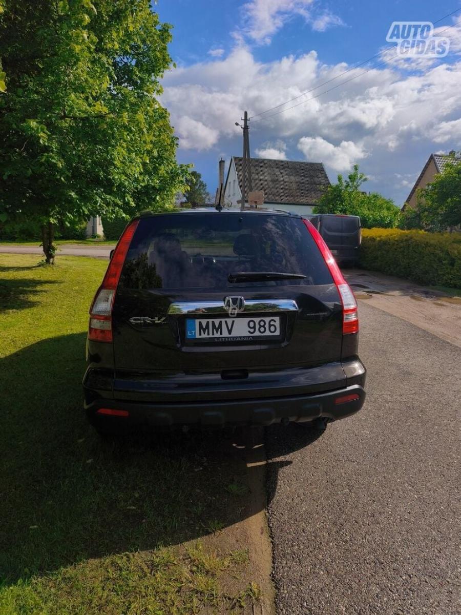 Brown Honda CR-V 2010 in Utena, with an engine capacity of 2.20 L and mileage of 341 thousand km for 5800 €, photo 13 on AUTOMOTO.COM.LV