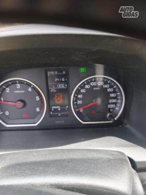 Brown Honda CR-V 2010 in Utena, with an engine capacity of 2.20 L and mileage of 341 thousand km for 5800 €, photo 15 on AUTOMOTO.COM.LV