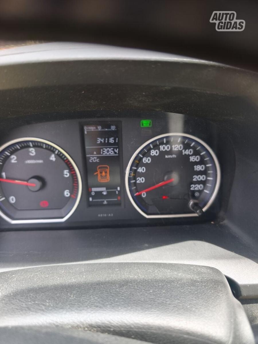 Brown Honda CR-V 2010 in Utena, with an engine capacity of 2.20 L and mileage of 341 thousand km for 5800 €, photo 15 on AUTOMOTO.COM.LV