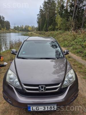 Brūns Honda CR-V 2010 Rīga, ar dzinēja tilpumu 2.20 L un nobraukumu 295 tūkst. km par 5000 €, foto 1 vietnē AUTOMOTO.COM.LV