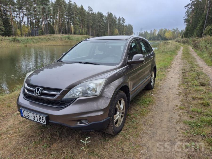 Brūns Honda CR-V 2010 Rīga, ar dzinēja tilpumu 2.20 L un nobraukumu 295 tūkst. km par 5000 €, foto 4 vietnē AUTOMOTO.COM.LV