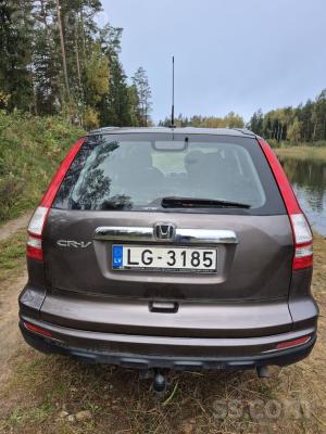 Brūns Honda CR-V 2010 Rīga, ar dzinēja tilpumu 2.20 L un nobraukumu 295 tūkst. km par 5000 €, foto 6 vietnē AUTOMOTO.COM.LV