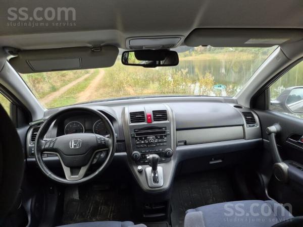 Brown Honda CR-V 2010 in Riga, with an engine capacity of 2.20 L and mileage of 295 thousand km for 5000 €, photo 7 on AUTOMOTO.COM.LV