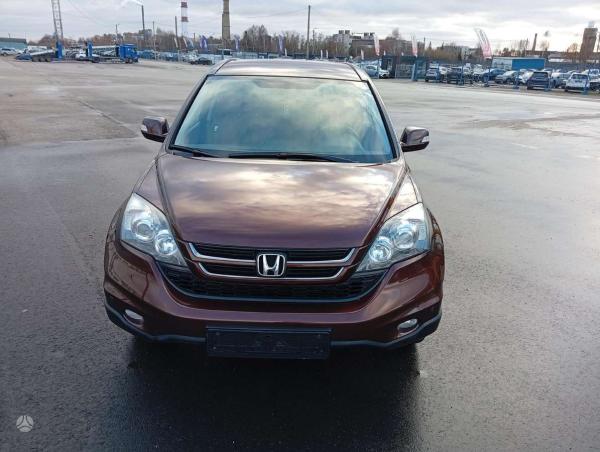 Brūns Honda CR-V 2011 Panevēža, ar dzinēja tilpumu 2.20 L un nobraukumu 244 tūkst. km par 6300 €, foto 1 vietnē AUTOMOTO.COM.LV