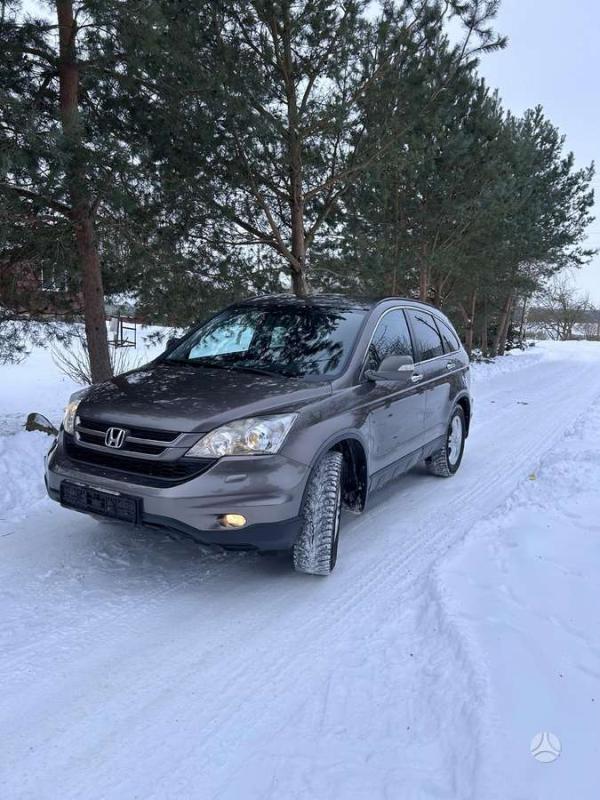 Brūns Honda CR-V 2011 Ukmergė, ar dzinēja tilpumu 2.00 L un nobraukumu 180 tūkst. km par 6300 €, foto 1 vietnē AUTOMOTO.COM.LV