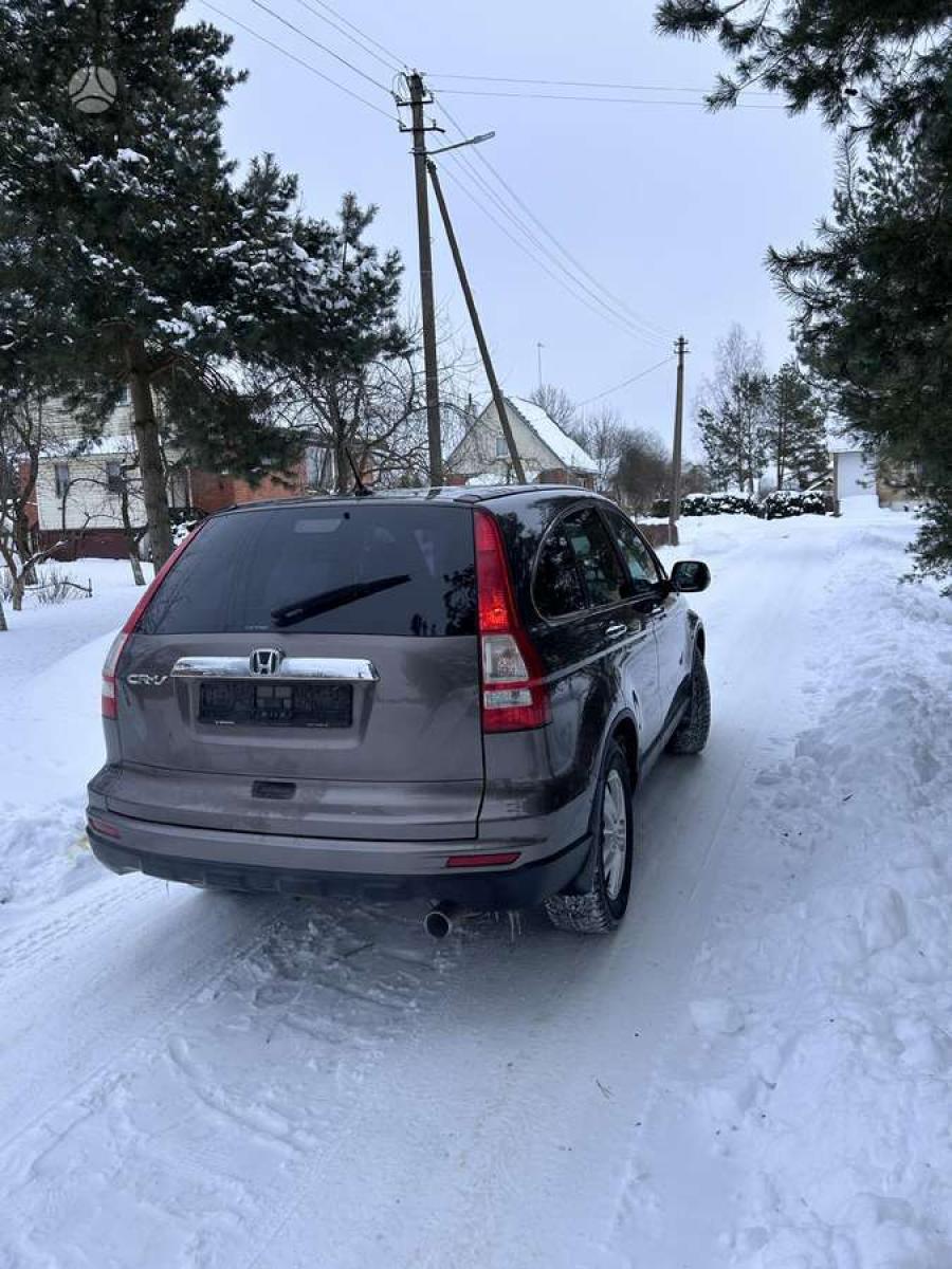 Brown Honda CR-V 2011 in Ukmerge, with an engine capacity of 2.00 L and mileage of 180 thousand km for 6300 €, photo 18 on AUTOMOTO.COM.LV