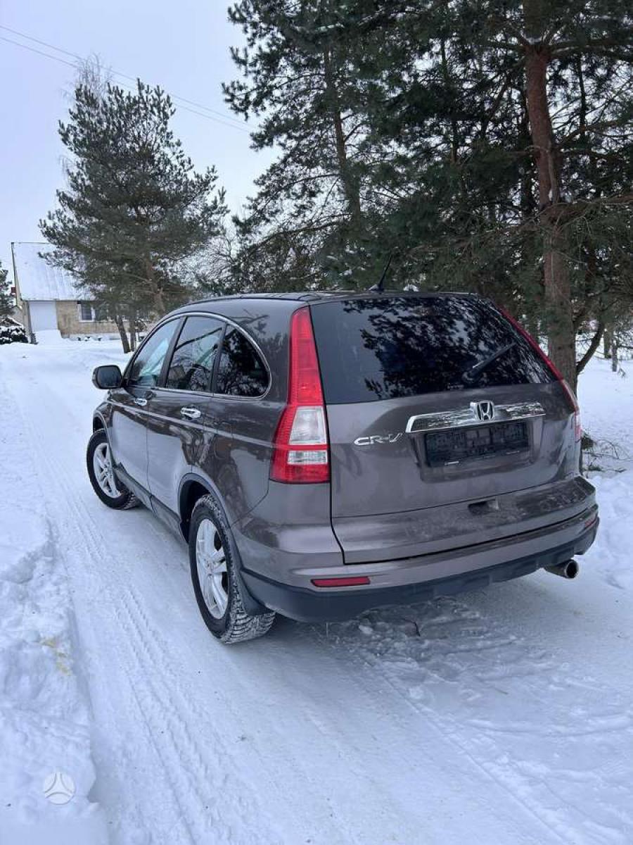 Brown Honda CR-V 2011 in Ukmerge, with an engine capacity of 2.00 L and mileage of 180 thousand km for 6300 €, photo 20 on AUTOMOTO.COM.LV