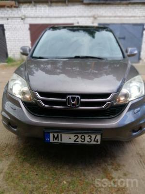 Brūns Honda CR-V 2011 Jelgava, ar dzinēja tilpumu 2.00 L un nobraukumu 245 tūkst. km par 7700 €, foto 5 vietnē AUTOMOTO.COM.LV