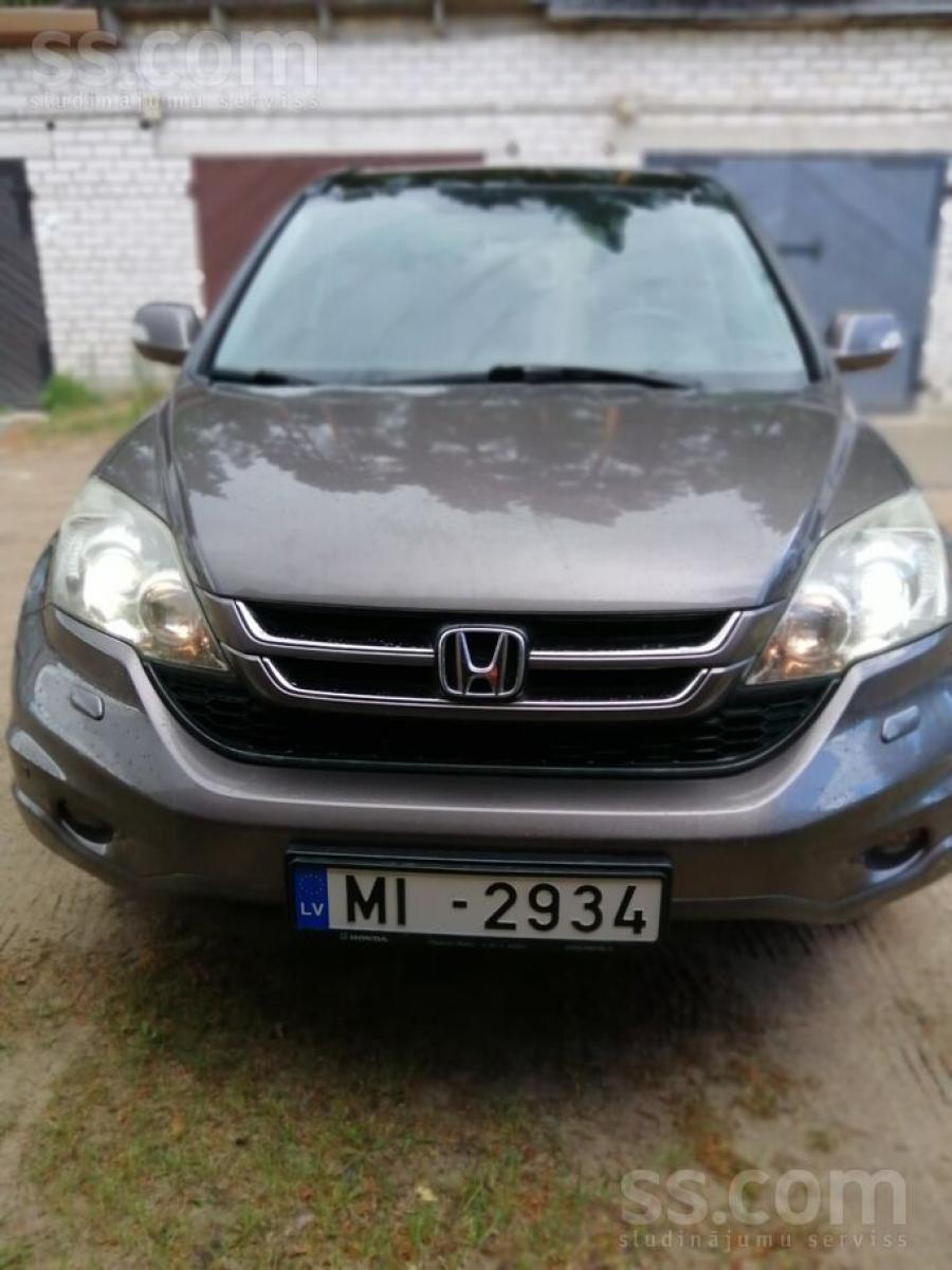 Brūns Honda CR-V 2011 Jelgava, ar dzinēja tilpumu 2.00 L un nobraukumu 245 tūkst. km par 7700 €, foto 5 vietnē AUTOMOTO.COM.LV