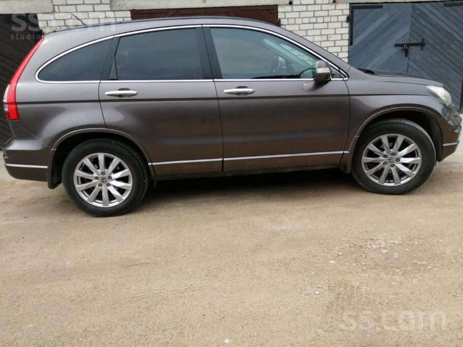 Brūns Honda CR-V 2011 Jelgava, ar dzinēja tilpumu 2.00 L un nobraukumu 245 tūkst. km par 7700 €, foto 6 vietnē AUTOMOTO.COM.LV