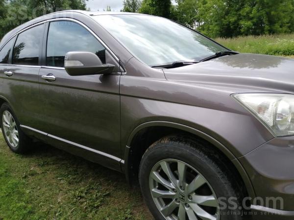 Brūns Honda CR-V 2011 Jelgava, ar dzinēja tilpumu 2.00 L un nobraukumu 245 tūkst. km par 7200 €, foto 3 vietnē AUTOMOTO.COM.LV