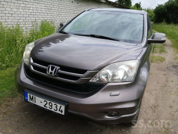 Brūns Honda CR-V 2011 Jelgava, ar dzinēja tilpumu 2.00 L un nobraukumu 245 tūkst. km par 7200 €, foto 4 vietnē AUTOMOTO.COM.LV