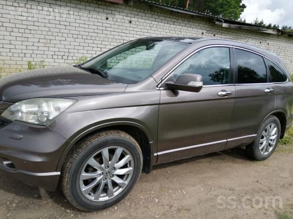 Brūns Honda CR-V 2011 Jelgava, ar dzinēja tilpumu 2.00 L un nobraukumu 245 tūkst. km par 7200 €, foto 5 vietnē AUTOMOTO.COM.LV