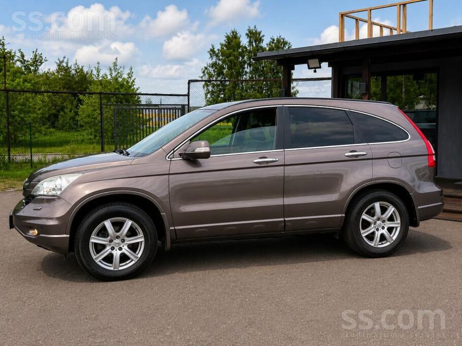Brown Honda CR-V 2011 in Riga, with an engine capacity of 2.20 L and mileage of 218 thousand km for 7250 €, photo 4 on AUTOMOTO.COM.LV
