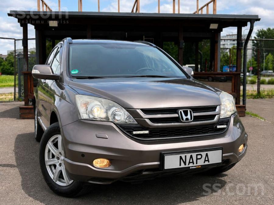 Brown Honda CR-V 2011 in Riga, with an engine capacity of 2.20 L and mileage of 218 thousand km for 7250 €, photo 5 on AUTOMOTO.COM.LV