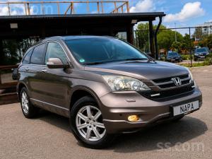 Brown Honda CR-V 2011 in Riga, with an engine capacity of 2.20 L and mileage of 218 thousand km for 7250 €, photo 6 on AUTOMOTO.COM.LV