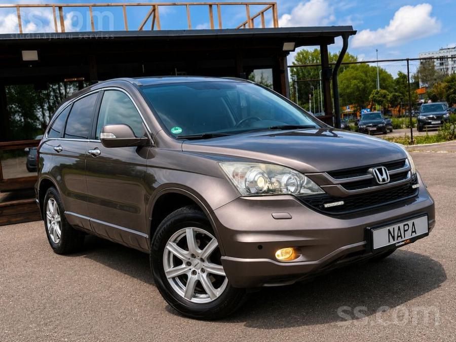 Brown Honda CR-V 2011 in Riga, with an engine capacity of 2.20 L and mileage of 218 thousand km for 7250 €, photo 6 on AUTOMOTO.COM.LV