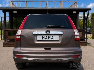 Brown Honda CR-V 2011 in Riga, with an engine capacity of 2.20 L and mileage of 218 thousand km for 7250 €, photo 9 on AUTOMOTO.COM.LV