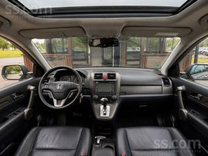 Brown Honda CR-V 2011 in Riga, with an engine capacity of 2.20 L and mileage of 218 thousand km for 7250 €, photo 12 on AUTOMOTO.COM.LV