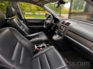 Brown Honda CR-V 2011 in Riga, with an engine capacity of 2.20 L and mileage of 218 thousand km for 7250 €, photo 13 on AUTOMOTO.COM.LV