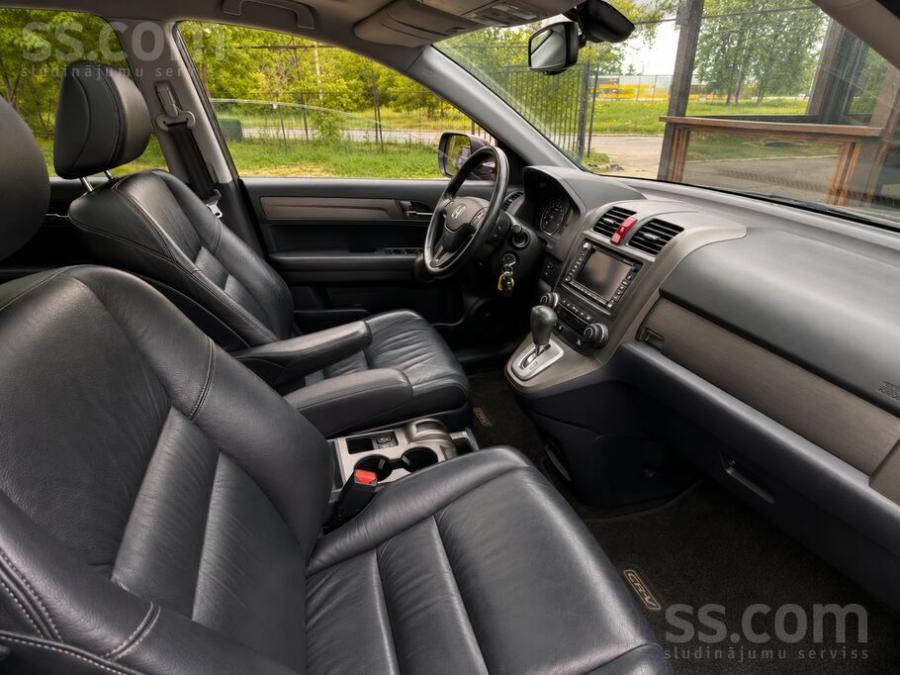 Brown Honda CR-V 2011 in Riga, with an engine capacity of 2.20 L and mileage of 218 thousand km for 7250 €, photo 13 on AUTOMOTO.COM.LV