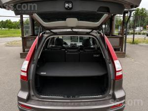 Brown Honda CR-V 2011 in Riga, with an engine capacity of 2.20 L and mileage of 218 thousand km for 7250 €, photo 16 on AUTOMOTO.COM.LV