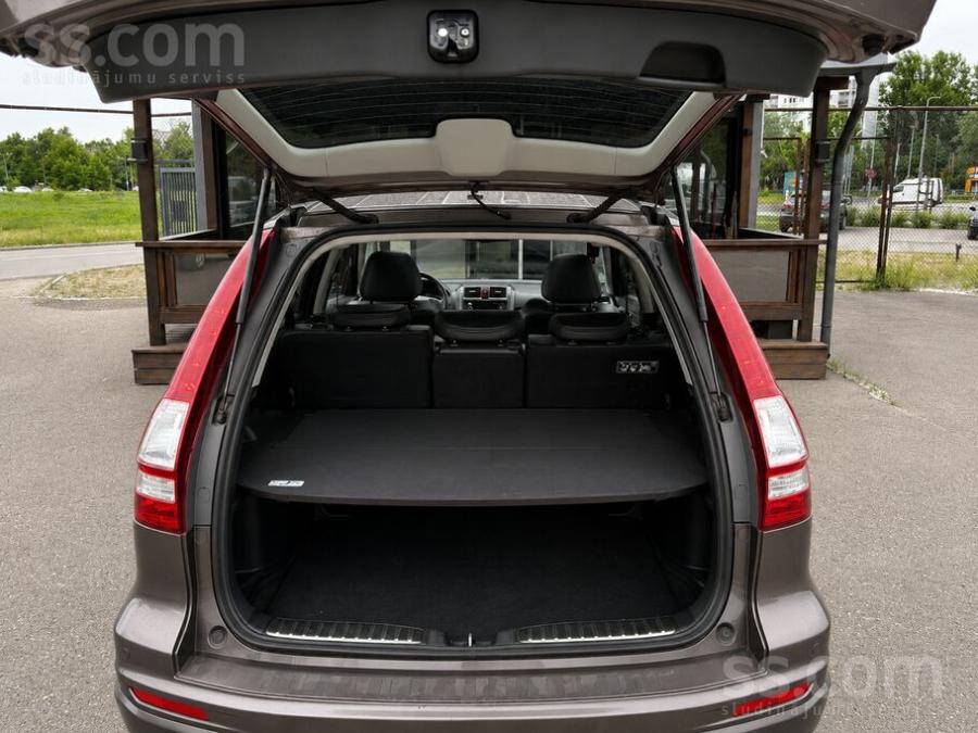 Brown Honda CR-V 2011 in Riga, with an engine capacity of 2.20 L and mileage of 218 thousand km for 7250 €, photo 16 on AUTOMOTO.COM.LV