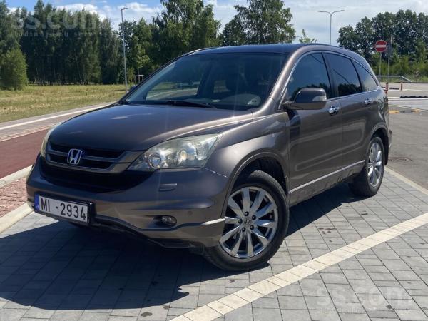 Brown Honda CR-V 2011 in Jelgava, with an engine capacity of 2.00 L and mileage of 0 thousand km for 6900 €, photo 2 on AUTOMOTO.COM.LV