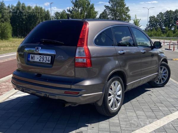 Brown Honda CR-V 2011 in Jelgava, with an engine capacity of 2.00 L and mileage of 0 thousand km for 6900 €, photo 3 on AUTOMOTO.COM.LV