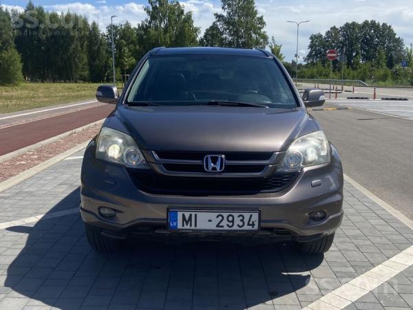 Brown Honda CR-V 2011 in Jelgava, with an engine capacity of 2.00 L and mileage of 0 thousand km for 6900 €, photo 6 on AUTOMOTO.COM.LV