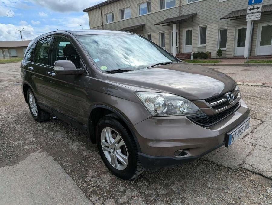 Brown Honda CR-V 2011 in Vilnius, with an engine capacity of 2.20 L and mileage of 249 thousand km for 6600 €, photo 1 on AUTOMOTO.COM.LV