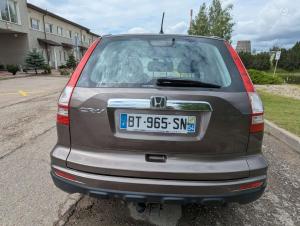 Brown Honda CR-V 2011 in Vilnius, with an engine capacity of 2.20 L and mileage of 249 thousand km for 6600 €, photo 3 on AUTOMOTO.COM.LV
