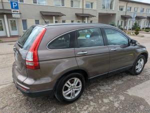 Brown Honda CR-V 2011 in Vilnius, with an engine capacity of 2.20 L and mileage of 249 thousand km for 6600 €, photo 4 on AUTOMOTO.COM.LV