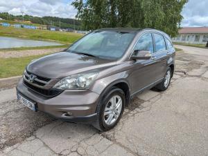 Brown Honda CR-V 2011 in Vilnius, with an engine capacity of 2.20 L and mileage of 249 thousand km for 6600 €, photo 5 on AUTOMOTO.COM.LV