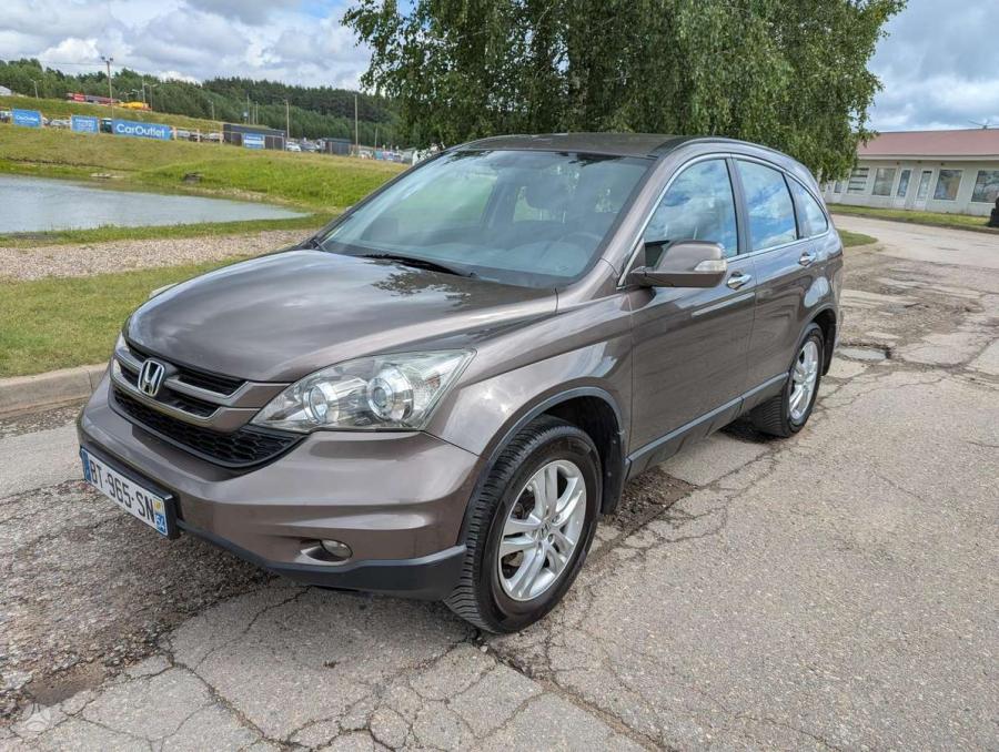 Brown Honda CR-V 2011 in Vilnius, with an engine capacity of 2.20 L and mileage of 249 thousand km for 6600 €, photo 5 on AUTOMOTO.COM.LV