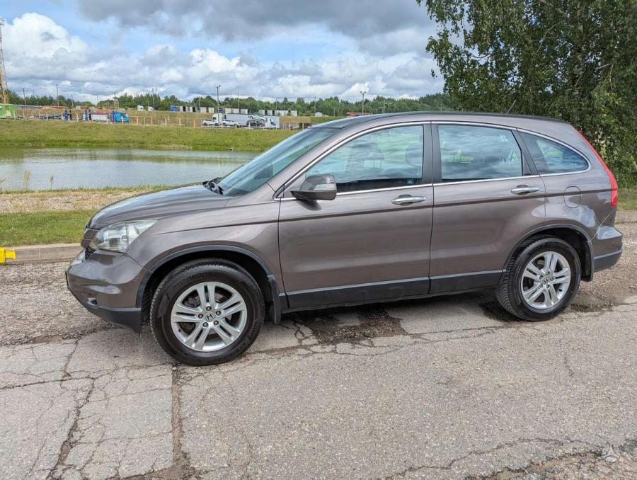 Brown Honda CR-V 2011 in Vilnius, with an engine capacity of 2.20 L and mileage of 249 thousand km for 6600 €, photo 6 on AUTOMOTO.COM.LV