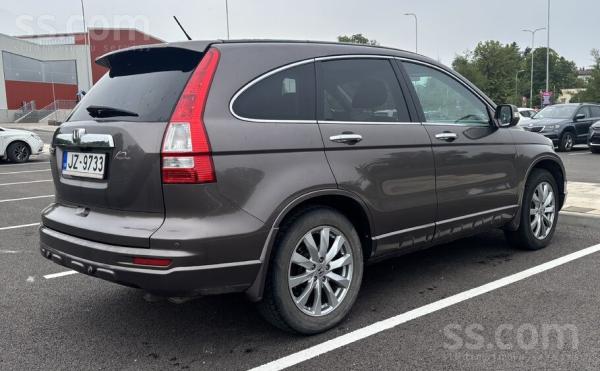 Brown Honda CR-V 2011 in Jelgava, with an engine capacity of 2.20 L and mileage of 340 thousand km for 6200 €, photo 3 on AUTOMOTO.COM.LV