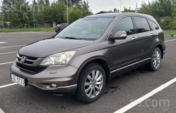 Brown Honda CR-V 2011 in Jelgava, with an engine capacity of 2.20 L and mileage of 340 thousand km for 6200 €, photo 6 on AUTOMOTO.COM.LV
