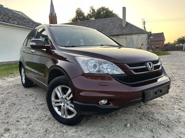 Brown Honda CR-V 2011 in Kaisiadorys, with an engine capacity of 2.20 L and mileage of 284 thousand km for 6450 €, photo 1 on AUTOMOTO.COM.LV