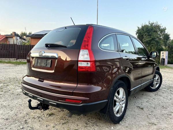 Brown Honda CR-V 2011 in Kaisiadorys, with an engine capacity of 2.20 L and mileage of 284 thousand km for 6450 €, photo 4 on AUTOMOTO.COM.LV