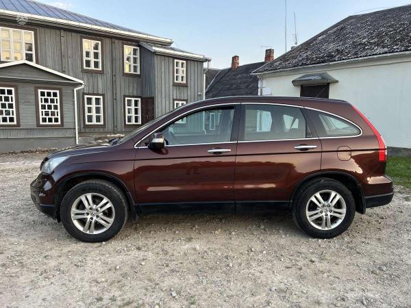 Brown Honda CR-V 2011 in Kaisiadorys, with an engine capacity of 2.20 L and mileage of 284 thousand km for 6450 €, photo 6 on AUTOMOTO.COM.LV