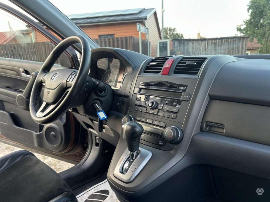 Brown Honda CR-V 2011 in Kaisiadorys, with an engine capacity of 2.20 L and mileage of 284 thousand km for 6450 €, photo 20 on AUTOMOTO.COM.LV