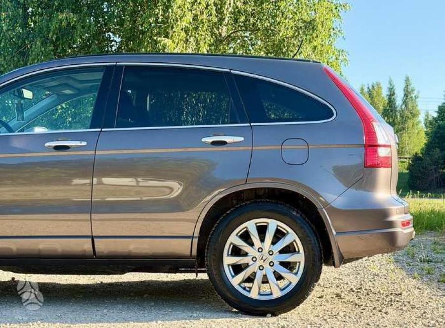 Brūns Honda CR-V 2011 Šauļi, ar dzinēja tilpumu 2.20 L un nobraukumu 245 tūkst. km par 8999 €, foto 13 vietnē AUTOMOTO.COM.LV